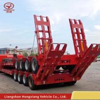 China Q345b / T700 Steel Main Beam 3/4 Axle Low Bed Truck Trailer for Heavy Duty Machinery for sale