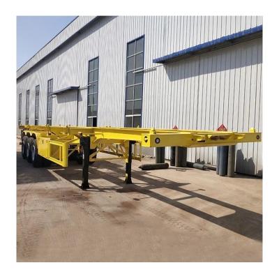 China Steel Flatbed Tri-Axles Container Transport Chassis Semi Trailer for Your Logistics for sale
