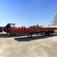 China 2/3/4 Axle Chinese Steel Sidewall Flat Semi-Trailer for Heavy-Duty Transportation for sale