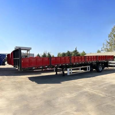 China 2/3/4 Axle Chinese Steel Sidewall Flat Semi-Trailer for Heavy-Duty Transportation for sale
