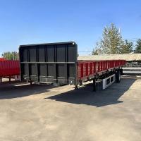 China 2/3/4 Axle Chinese Steel Sidewall Flat Semi-Trailer for Heavy-Duty Transportation for sale