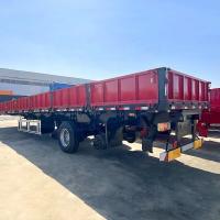 China 2/3/4 Axle Chinese Steel Sidewall Flat Semi-Trailer for Heavy-Duty Transportation for sale