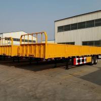 China 2/3/4 Axle Chinese Steel Sidewall Flat Semi-Trailer for Heavy-Duty Transportation for sale