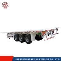 China 2/3 Axle 20/40 FT Flatbed Trailer Customized Color Skeleton Chassis Deck Semi Trailer for sale