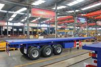China 8.12.16 Tire 3/4 Axle 60 Ton Container Transport Flat Deck Truck Trailer Semi-Trailer for sale