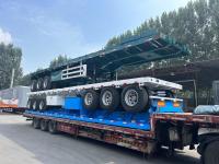 China 8.12.16 Tire 3/4 Axle 60 Ton Container Transport Flat Deck Truck Trailer Semi-Trailer for sale