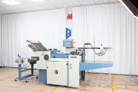 China 530mm Width Commercial Paper Folding Machine With PLC Controlled 220m / Min for sale