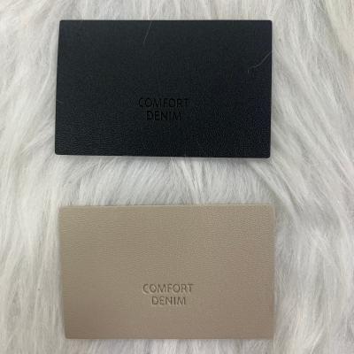 China Custom Embossed Logo Denim Patch in PU Leather Designed for Personalized Jeans for sale