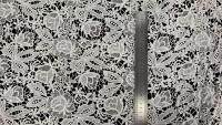 China Eco-Friendly 3D White Embroidered Polyester Lace Fabric with Floral Design for Ladies' Wedding Dresses and Clothing Decoration for sale