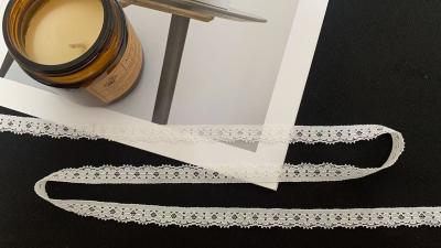 China 1.2cm White Symmetric Hollow-out Nylon Lace Trim with Delicate Scalloped Edge Eco-Friendly Elastic Fabric for Garment Sewing for sale