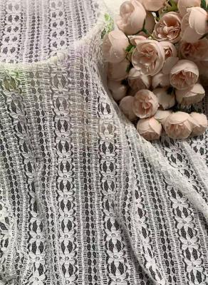 China 100% nylon/spandex Vertical Floral Striped Lace Fabric, Continuous Flower Stripe Hollow Mesh Lace for Women Dress Lingerie for sale
