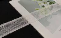 China 4.5cm Hollow Oval Jacquard Lace Trim with Double Scalloped Edge for Garment Decoration for sale