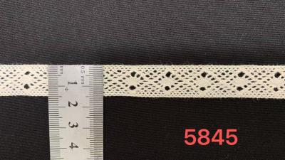 China 1.5cm Cotton Crochet Lace Trim with Symmetrical Hollow Geometric Shape and Soft Hand Feel for Garment Trimming for sale