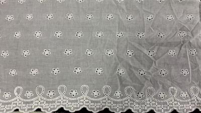 China Cotton Eyelet Cutwork Fabric, All‑Over Floral Embroidery with Decorative Scalloped Edge for Dress Sewing for sale