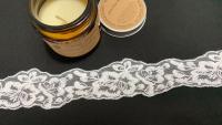 China 4cm Width Milk Yarn Lace Trim with Continuous Floral Pattern and Wavy Edge for Garment Trimming for sale