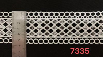 China 5.5cm Width Milk Yarn Lace Trim with Geometric Hollow Pattern and Neat Edge Stable Workmanship for Garment Decoration for sale