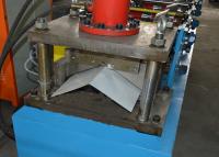 China 0.8mm Metal Roofing Ridge Cap Roll Former Equipment Garage Door Roll Forming Machine for sale