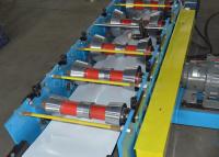China 0.8mm Metal Roofing Ridge Cap Roll Former Equipment Garage Door Roll Forming Machine for sale