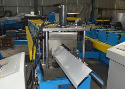 China 0.8mm Metal Roofing Ridge Cap Roll Former Equipment Garage Door Roll Forming Machine for sale