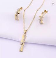China Gold Stainless Steel Jewelry Set X Shaped Rhinestone Stud Earrings And Necklace Set for sale