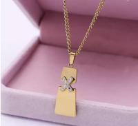 China CE Stainless Steel Designer Jewelry X Rhinestone Inlaid Pendant Necklace Earrings Set for sale