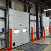 China Automatic Vertical Lifting Industrial Sectional Doors Polyurethane Foam Insulation for sale