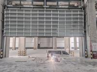 China High Efficient Warehouse Aluminum Industrial Sectional Doors For Loading Bay Area for sale