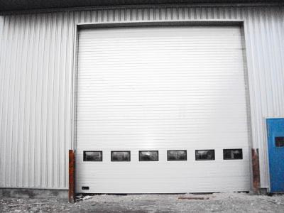 China 2 Class Air Permeability Industrial Sectional Garage Doors High Speed for sale