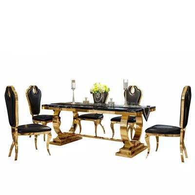 China Rectangle Shape Dubai 8 Seater Marble Dining Table Set Stainless Steel Base With Chairs for sale