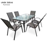 China 7 Piece Metal Garden Dining Set with Tempered Glass Table and Steel Frame for sale