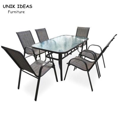 China 7 Piece Metal Garden Dining Set with Tempered Glass Table and Steel Frame for sale