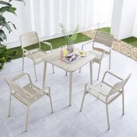 China Stackable Outdoor Garden Coffee Table and Chair Set Waterproof Metal Patio Furniture 4 Piece for sale