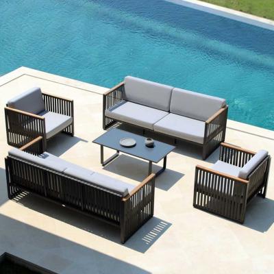 China Modern Rattan Garden Sofa Chair Set Aluminum Frame PE Rattan Waterproof 1 2 3 Seat for sale