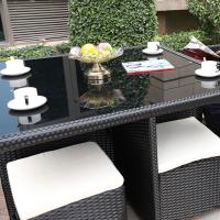 China 8 Seater Outdoor Rattan Garden Furniture Set with Tempered Glass Coffee Table for sale