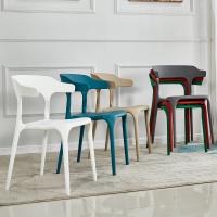 China Lightweight Stackable Plastic Chairs with Armrest for Events Weddings 440mm Seat Height for sale