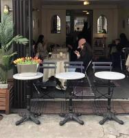 China Outdoor Garden Rattan Dining Table and Chair Set 4 Seater Metal Frame Patio Furniture for sale