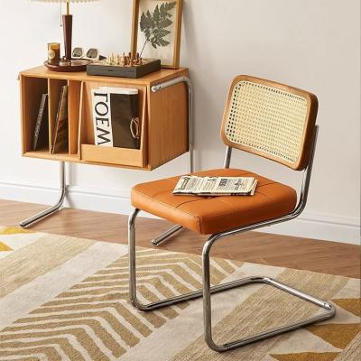 China Modern Solid Wood Rattan Dining Chair with Stainless Steel Frame for Cafe Conference Use for sale