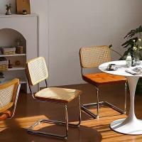 China Modern Solid Wood Rattan Dining Chair with Stainless Steel Frame for Cafe Conference Use for sale