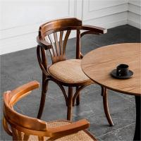 China Nordic Retro Rattan Dining Chair with Armrests for Small Apartment Modern Wood Leisure Seat for sale