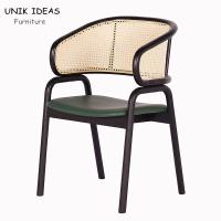China Modern Nordic Dining Chair Solid Wood Frame Rattan Backrest PU Leather Seat Black for sale