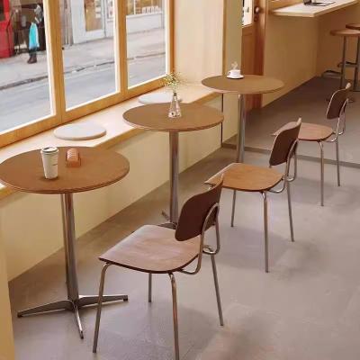 China Nordic Style Cafe Tables and Chairs Set Handcrafted Iron Art Ocean Board Wood for Milk Tea Shops for sale