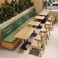 China Modern Wabi Sabi Commercial Dining Table and Chair Set PU Leather Wood Restaurant Furniture for sale