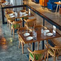 China Retro American Style Solid Wood Metal Base Restaurant Dining Table and Chair Set 4 Seats for sale