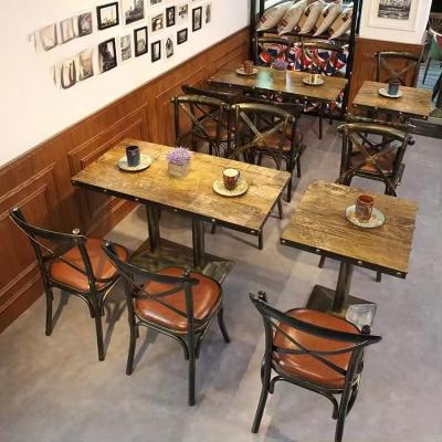 China Retro American Industrial Vintage Style Plywood Wooden Coffee Table and Chairs Fast Food Cross Back Dining Set for sale