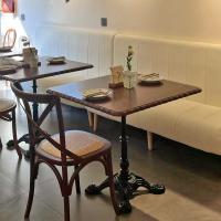 China French Bistro Marble Table and Stackable Wooden Cross Back Restaurant Cafe Chairs Set for sale