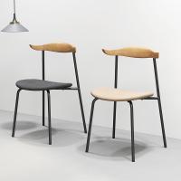 China Nordic Solid Wood Cow Horn Chair 41x47x78cm PU Leather Metal Dining Side Chair for sale