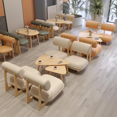 China Modern Restaurant Dining Table and Chairs Set PU Leather Wooden Coffee Shop Furniture Custom Color for sale