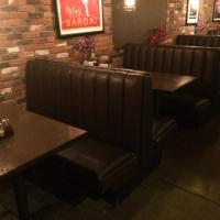 China Industrial Rustic Coffee Shop Pub Bench with Button Back Custom Size Wooden PU Leather for sale