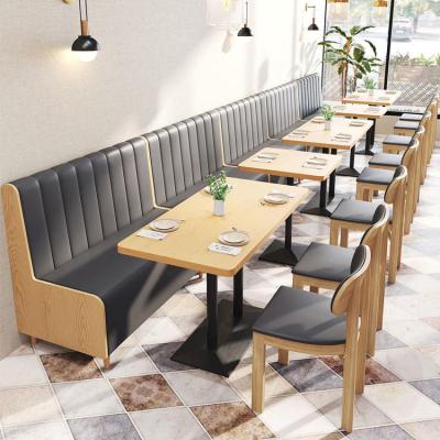 China Customizable Modern Commercial Restaurant Tables and Chairs Set with Solid Wood and PU Leather for sale