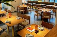 China Minimalist Design Wooden Table Chairs Set with Premium Comfort for Multi-Venue Adaptability in Restaurants and Cafes for sale